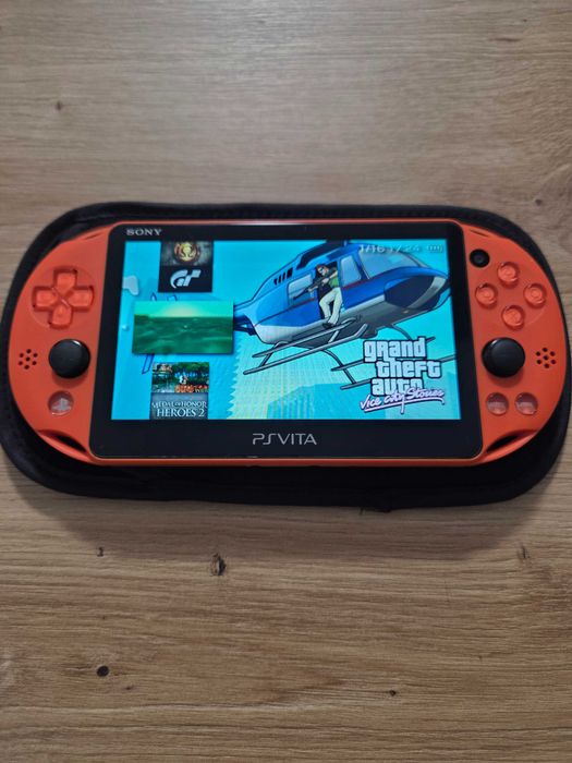 PS Vita Slim Red modat cu Sandisk Ultra 64gb impecabil cu folie Craiova ...