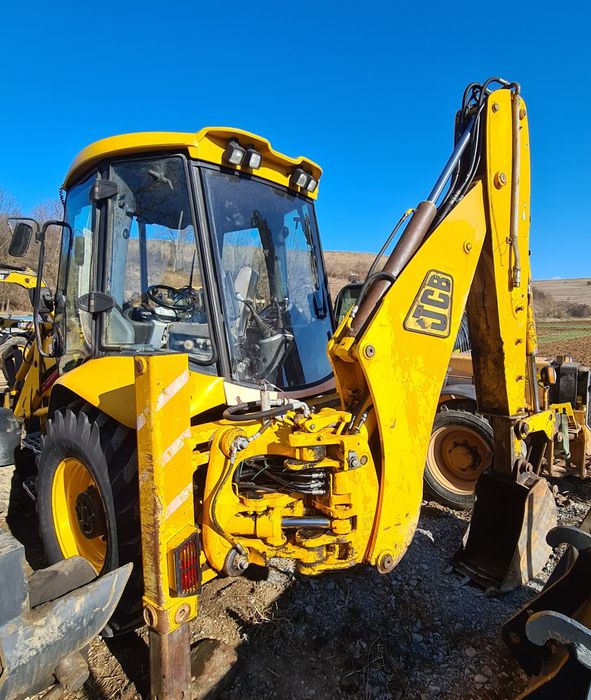 Buldoexcavator jcb 3cx Domosu • OLX.ro