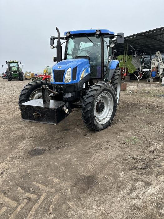 New holland t6050 model Elite + met john deere 4000 litri 27 metri ...