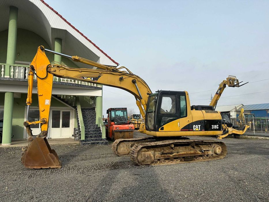 Excavator pe senile Caterpillar 318C , 2010 Negresti-Oas • OLX.ro