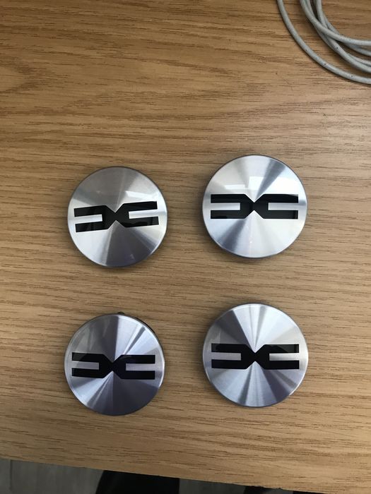 Capace jante Duster-Logan cu noul logo Mioveni • OLX.ro