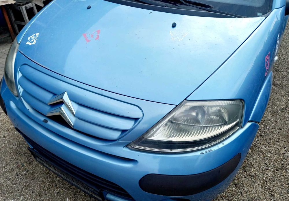 Citroen C3, bara fata cu grile si bandouri, armatura bara, capota ...