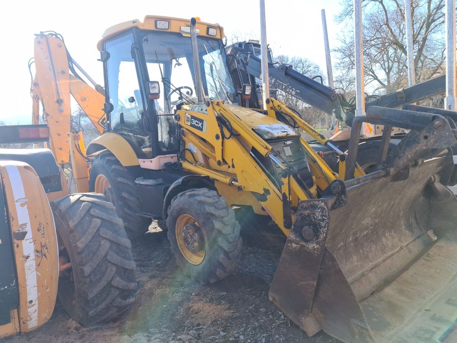 Buldoexcavator jcb 3cx Domosu • OLX.ro