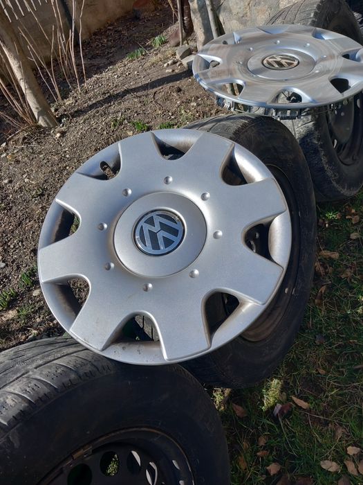 Set roti tabla VW 16' cu capace VW originale noi Babeni • OLX.ro