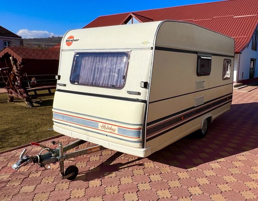 Rulota Burstner Holiday cu 2 zone, masa maximă 900 kg Dragasani • OLX.ro