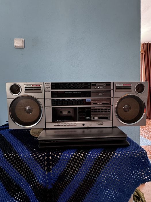 Sharp gx 250 srate foarte buna functioneaza pe radio si pe caseta ...