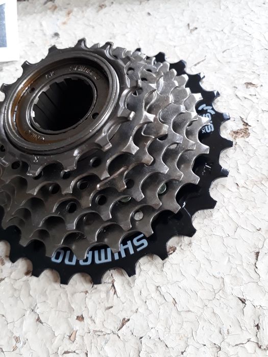 Pinioane SHIMANO filet 7 viteze Targu Jiu • OLX.ro