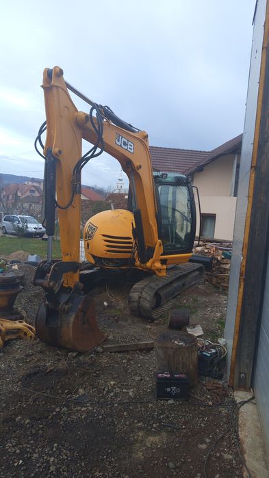 Vând - schimb excavator jcb buldoexcavator caterpillar Halmasd • OLX.ro
