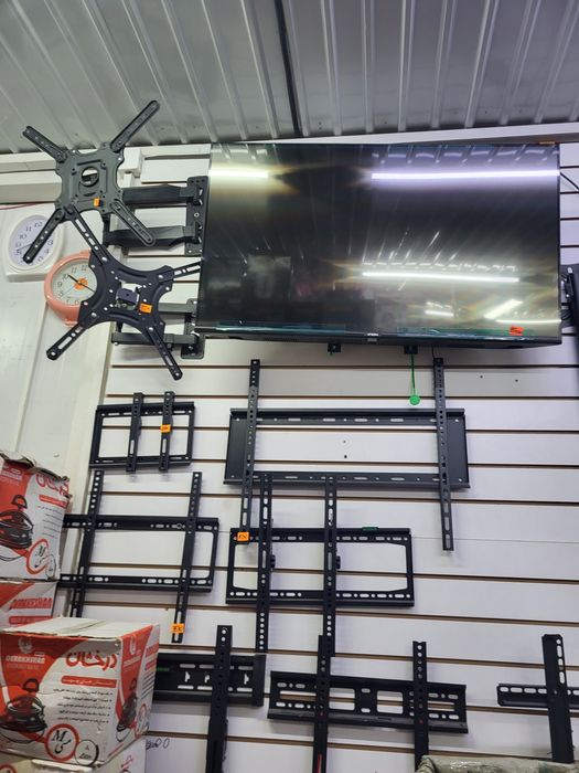 Кронштейн для телевизора. Крепление для подвески телевизора на стену ...