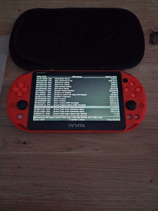 PS Vita Slim Red modat cu Sandisk Ultra 64gb impecabil cu folie Craiova ...