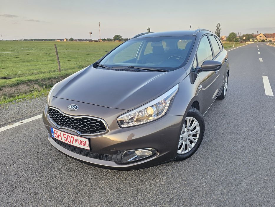 Kia Ceed 1.6 CRDi SW 128CP Moka Brown Navi Cameră Euro5 Oradea • OLX.ro