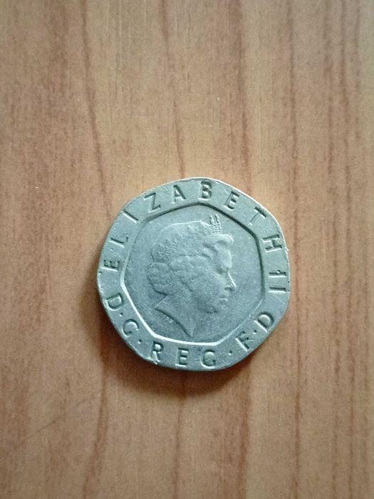 Vand 4 monede cu regina Elizabeth + 2 monezi USA+ una elvetiana ...