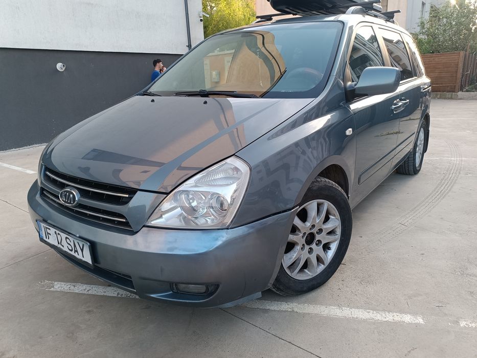 Vand urgent urgent kia carnival EX automata Rosu • OLX.ro