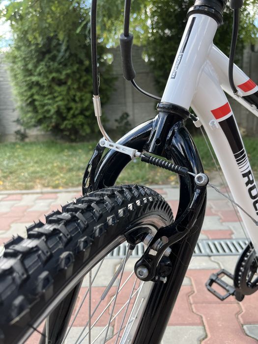Vând bicicletă copii, Rockrider ST100, roti 24 inch Lalosu • OLX.ro