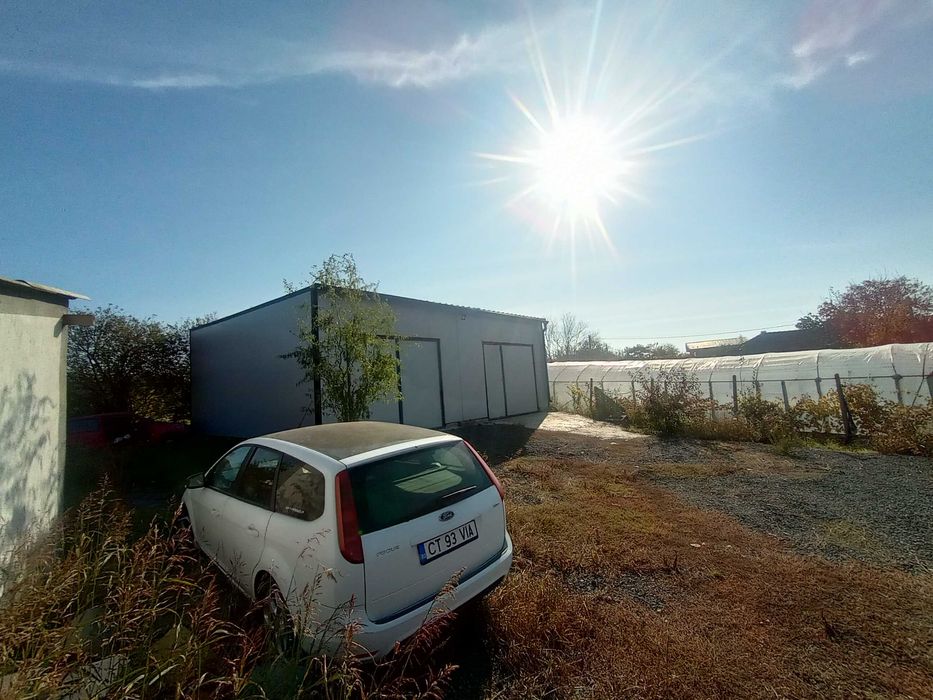 Vând garaj 10L x10l x 4h din structura metalica si panou sandwich ...