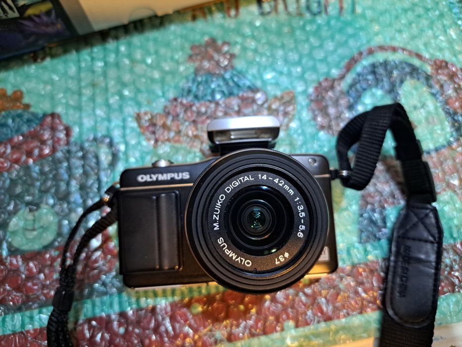 Olympus Pen Mini E-PM2 + 14-42mm f/3.5-5.6 II R – Mirrorless compact ...