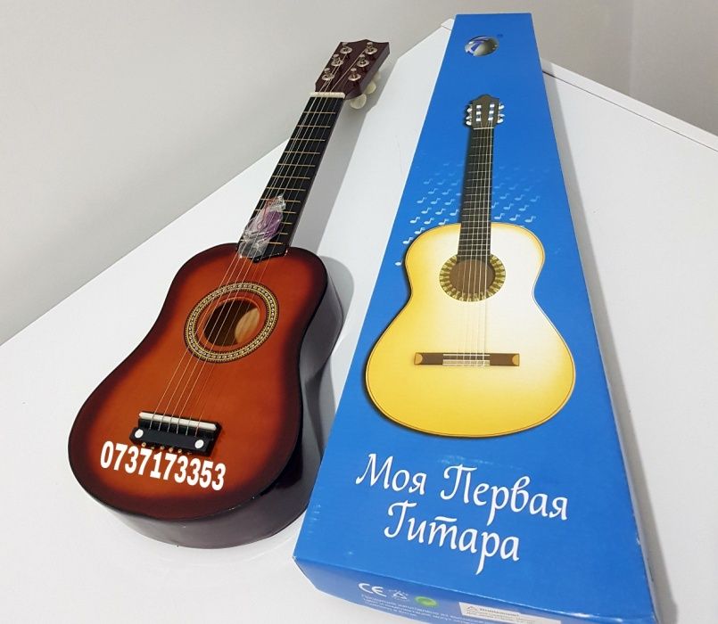 Chitara din lemn pentru copii, 6 corzi metalice 55cm/ diverse culori Voluntari • OLX.ro