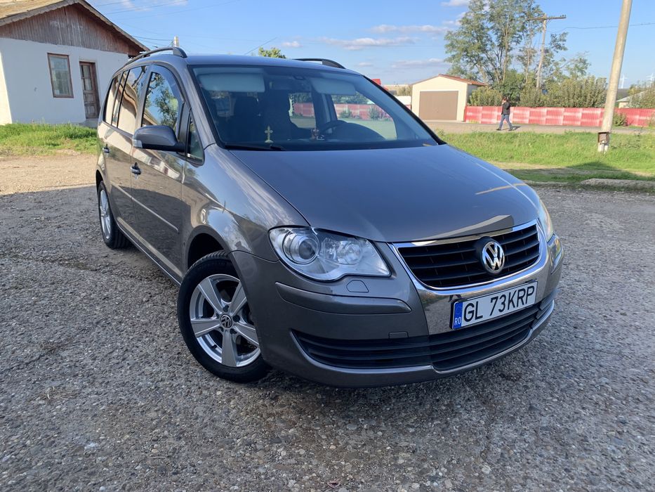 Vw Touran 2009 Automat DSG 7 locuri unic proprietar Impecabil Tecuci • OLX.ro
