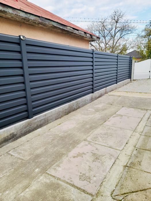 Gard din tabla cutata Viking, model T35 fatada, vopsita electrostatic Craiova • OLX.ro