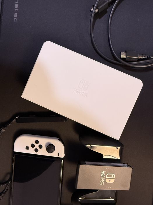 Nintendo Switch Oled с 11 игри и карта памет гр. Добрич Център • OLX.bg
