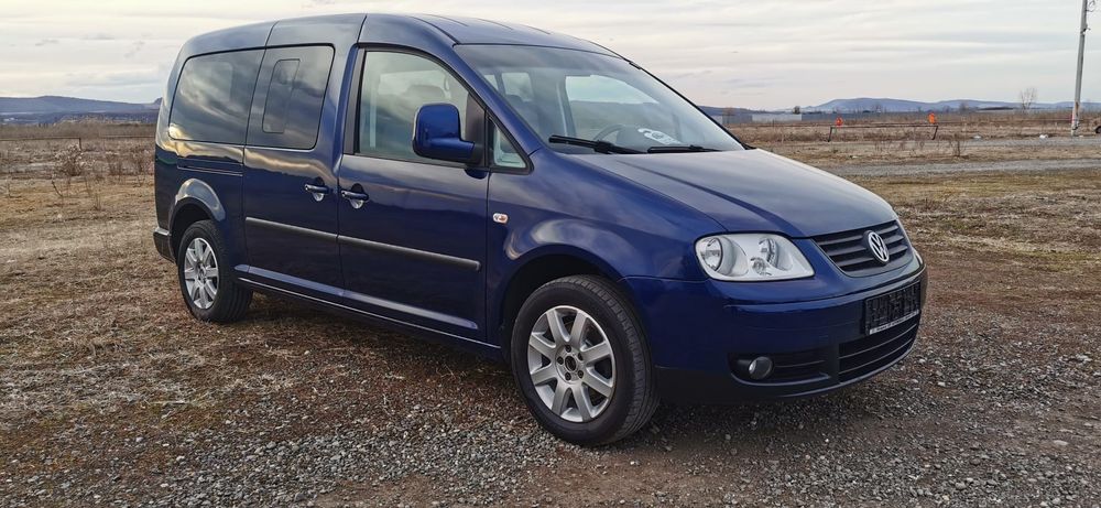 Volkswagen caddy maxi 7 locuri 1.9 tdi 105 cp Targu-Mures • OLX.ro