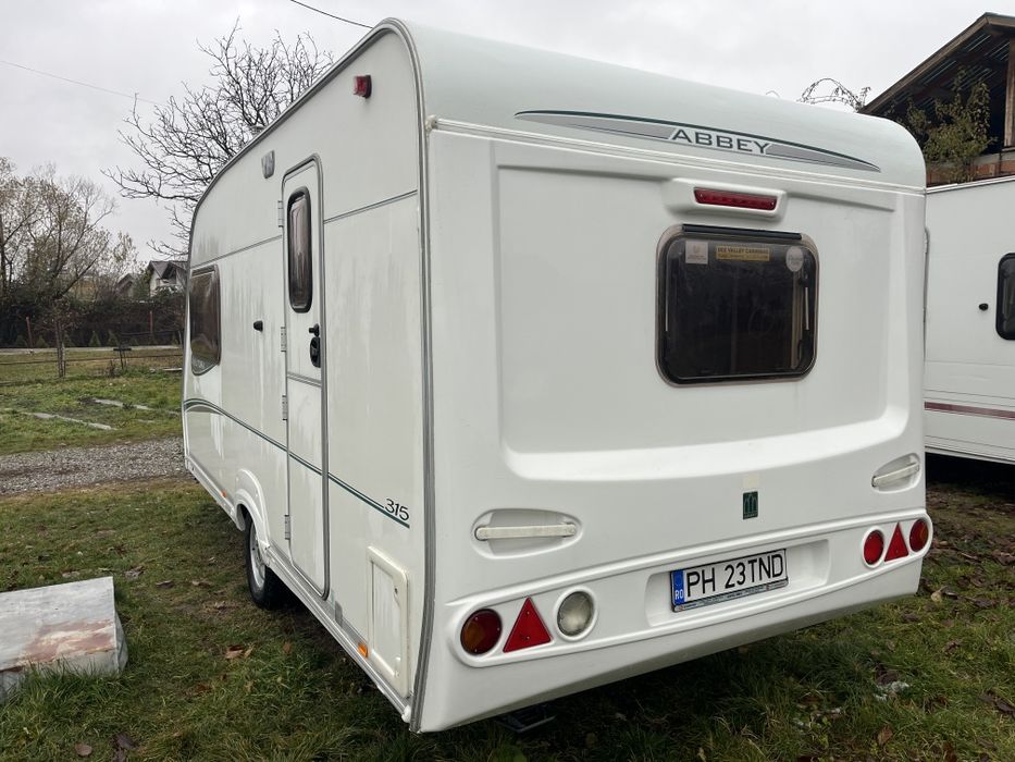 Rulota Swift Abbey Aventura 2006, Inmatriculata,Boiler gaz,Cabina dus Targoviste • OLX.ro