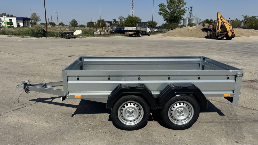 Remorca auto Niewiadow 250x125x34cm 2 axe 750kg cat B Denta • OLX.ro