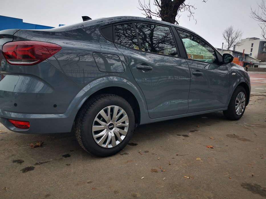 Capace roti Logan 3-capace roti 15 Dacia sigla nouă /Logan New Model ...