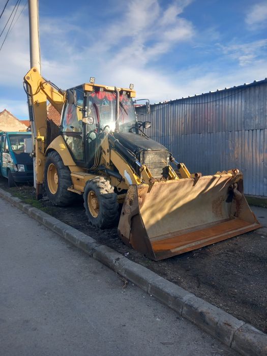 Vind buldoexcavator caterpillar 428e Arad • OLX.ro