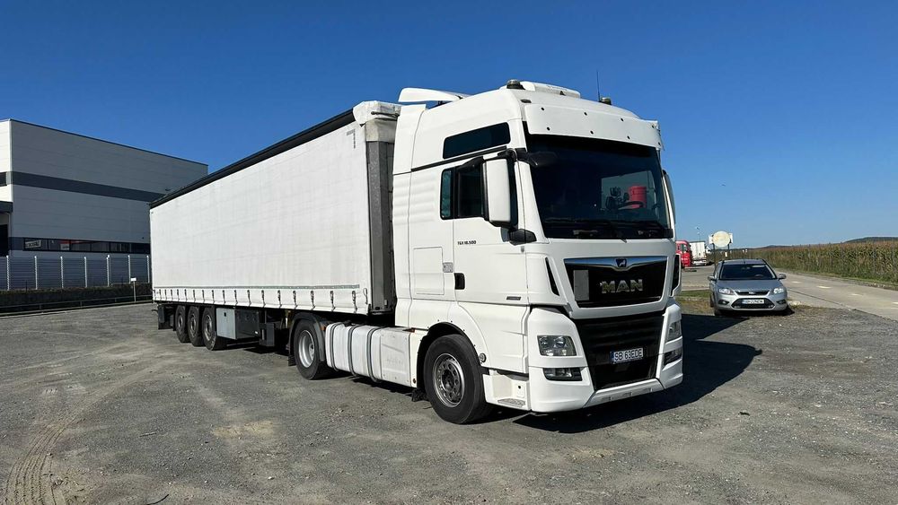 MAN TGX 18.500 2017 motor nou, plus semiremorca standard Schmitz 2018 ...