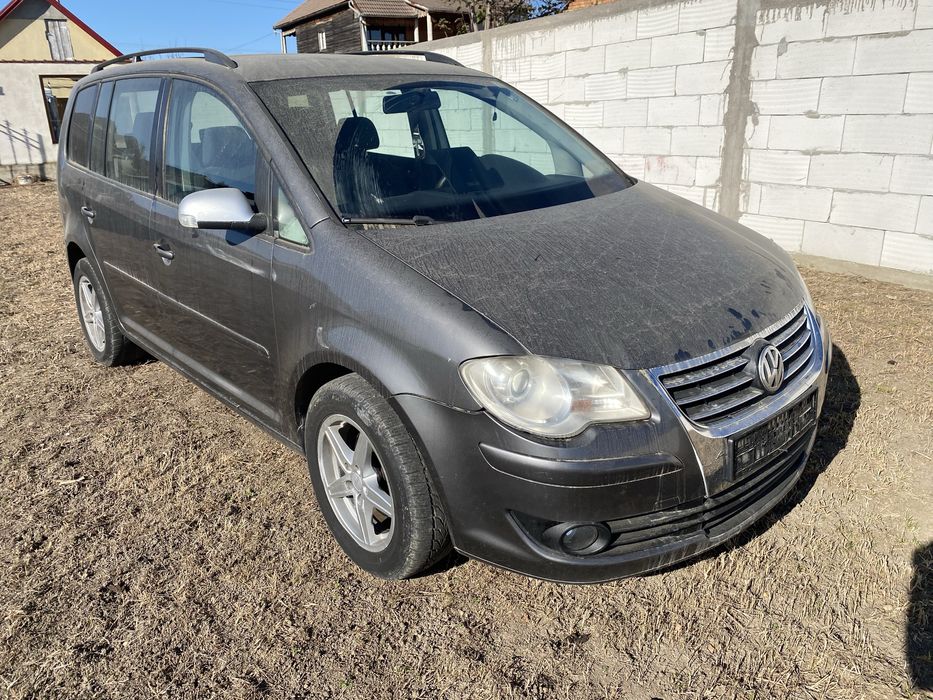Dezmembrez vw touran 2009 7 locuri dsg 2.0tdi 140 cp bmm cod motor Pancota • OLX.ro