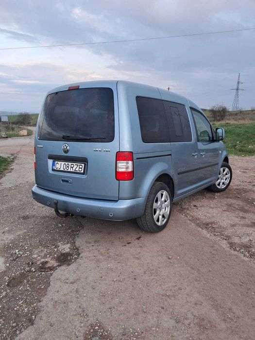 VW CADDY 7 locuri Copaceni • OLX.ro