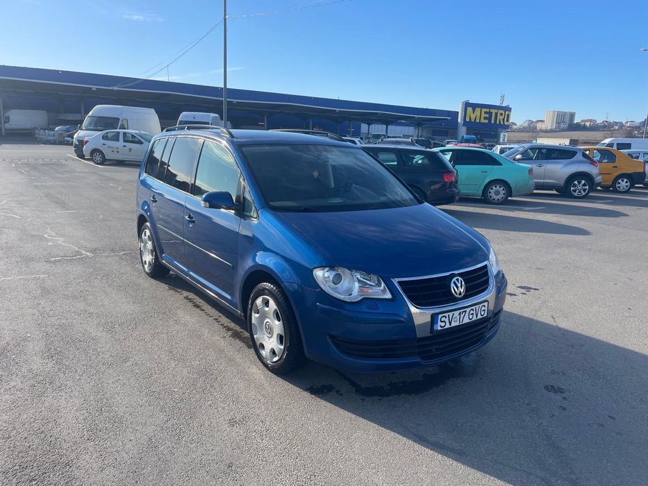 Vând VW Touran, 7 locuri, an-2009, pilot automat, dotări multiple Sfantu Ilie • OLX.ro