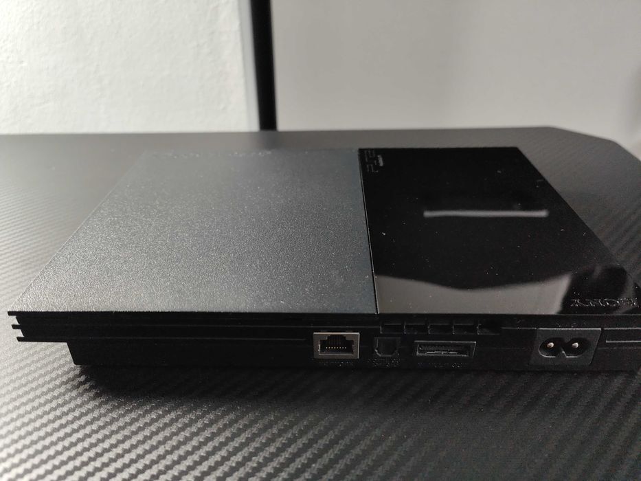 PlayStation 2 slim ,la cutie , ca nou, maneta ,cabluri Cluj-Napoca • OLX.ro