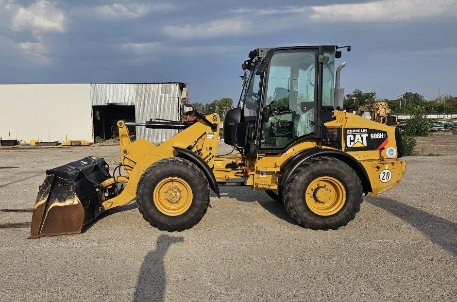 Caterpillar 908H2 2014 cu cupa si furci mini vola incarcator frontal ...