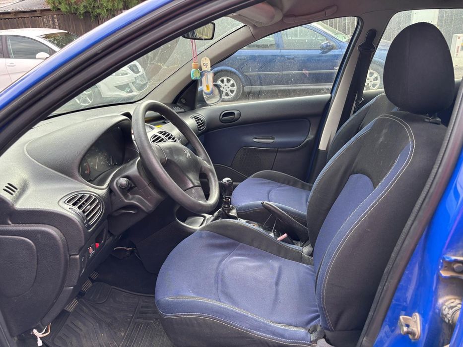 Masinā Peugeot 206 Romanesti • OLX.ro