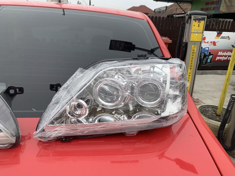 Vând faruri angel eyes logan Babeni • OLX.ro