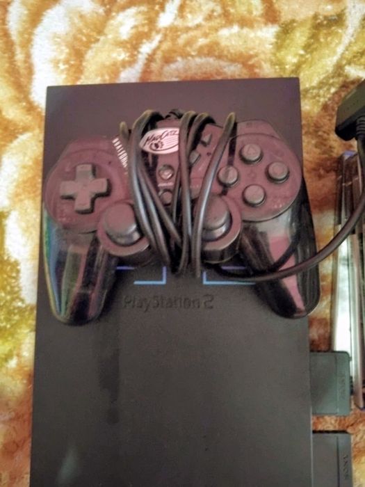 PS2 PlayStation 2 + 2 manete + 14 jocuri – trimit prin curier Descrier ...