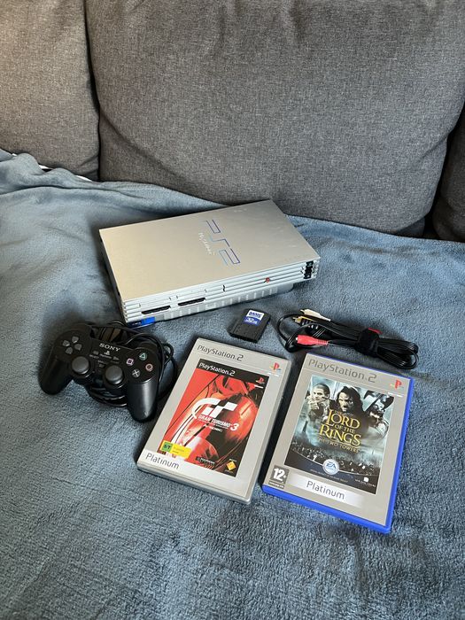 Playstation 2 Silver Edition + maneta + jocuri Turda • OLX.ro