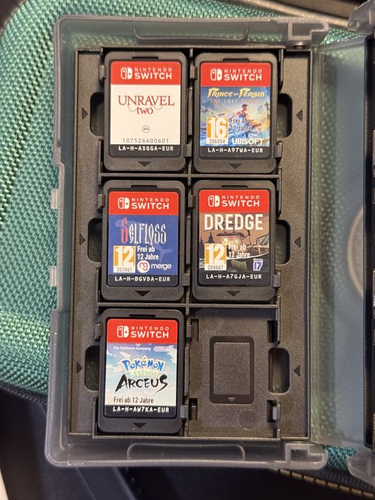 Nintendo Switch Oled с 11 игри и карта памет гр. Добрич Център • OLX.bg