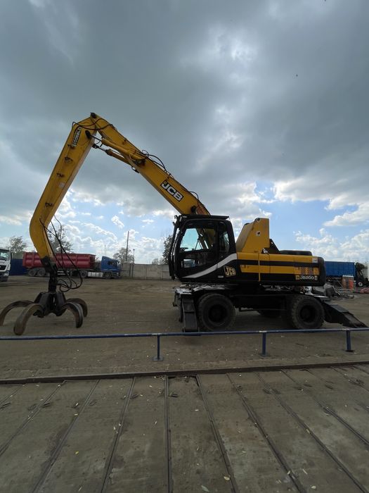 Excavator/Greifer pe roti pline JCB js200w fier/pet/carton Oradea • OLX.ro