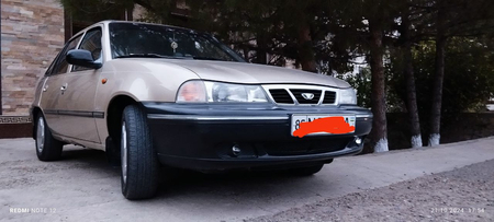Neksiya 1 sons 1998 yil