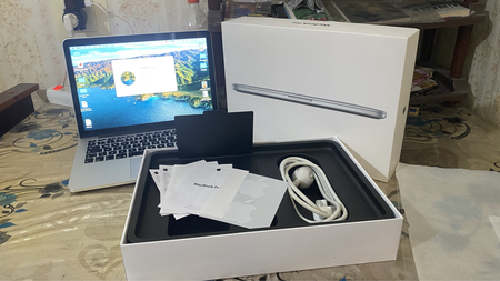 Macbook pro 14 holati yangi. Narxini kelishamiz.