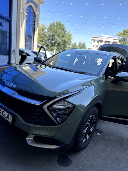 Kia Sportage. 1-pozitsiya. Green