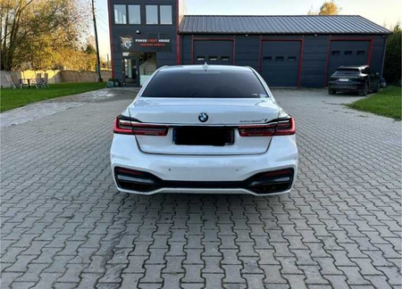 Bmw 7 4,4 бензин гибрид