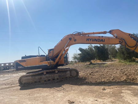 Hyundai 300 гусеничный экскаватор
