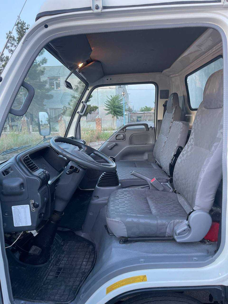 Isuzu 2022 yil 145000 yurgan Xolati a'lo