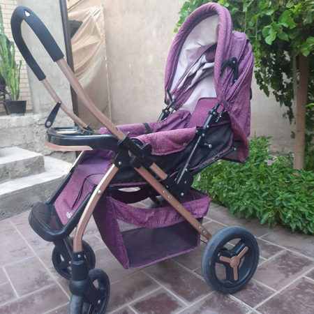 Детская прогулочная коляска Goodbaby.