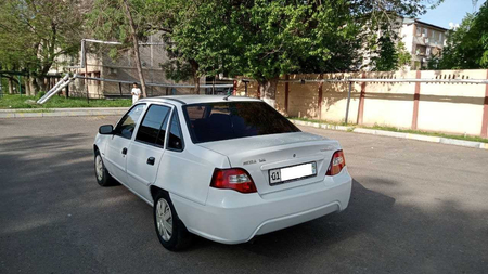 Chevrolet Nexia 1.6 DOHC 2012г. Белая (10U).