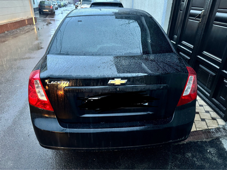 Chevrolet Lectti Black ket metallic. Qora Gentra sotiladi